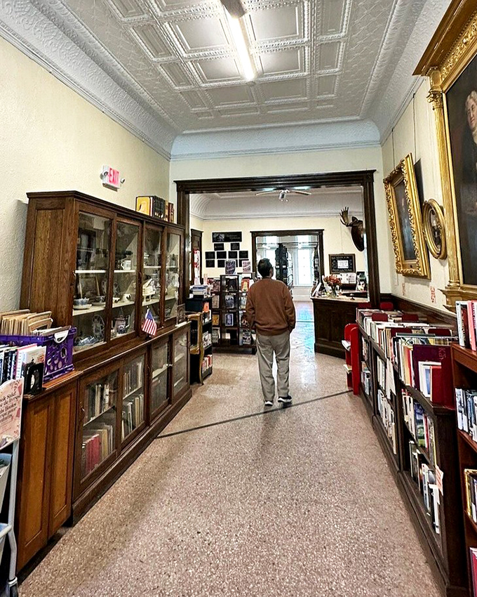 Step into yesterday through this elegant corridor. The gleaming wood and vintage display cases whisper stories of visitors past.