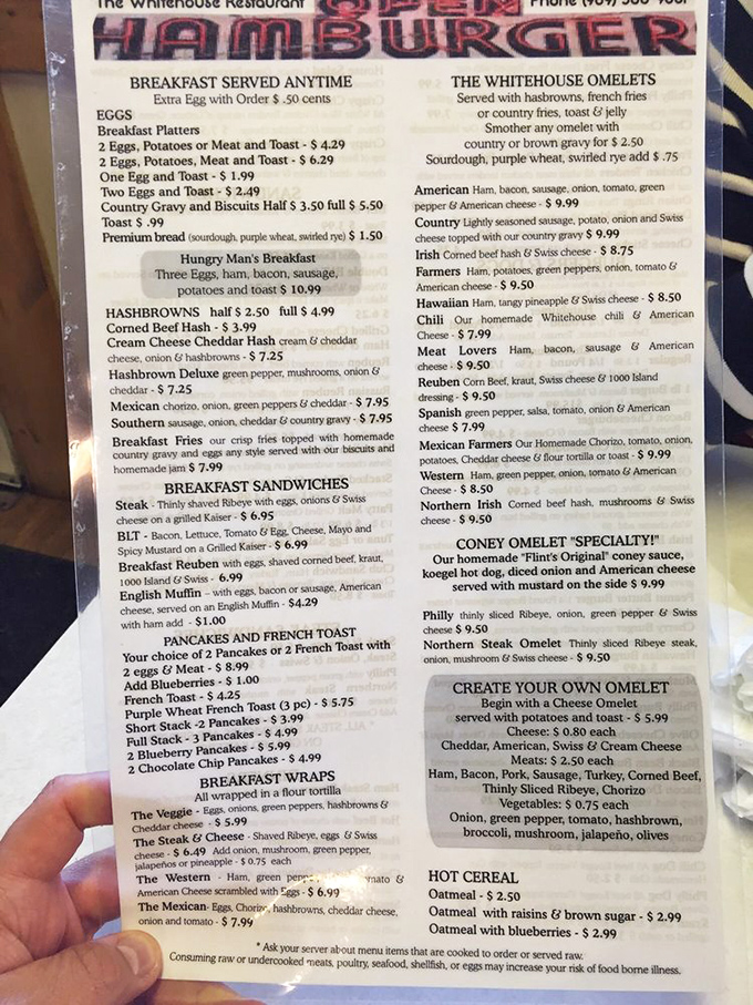 The slightly worn laminated menu tells you everything you need to know, this place prioritizes feeding you well over fancy descriptions or trendy ingredients.