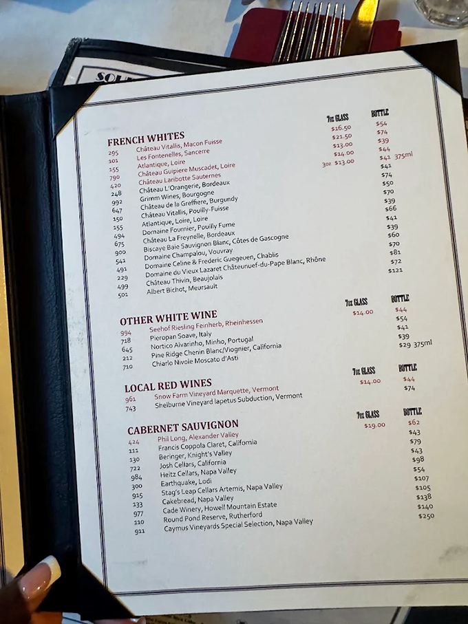 A wine list that reads like a love letter to French vineyards, offering liquid adventures from Loire to Bordeaux without the jet lag.