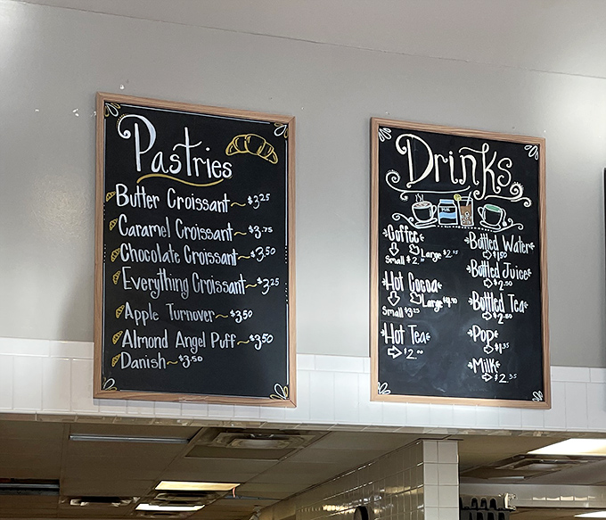 Handwritten menu boards prove someone here has both artistic talent and delicious priorities, listing temptations that make choosing feel impossible yet necessary.
