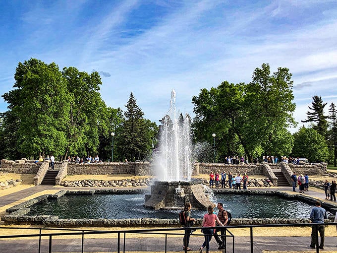 Olcott Park's magnificent fountain creates a gathering place where water dances skyward, surrounded by meticulously maintained gardens.
