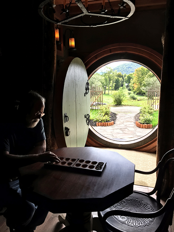 Peering through the iconic round doorway into a world where fantasy meets reality in this meticulously crafted space.