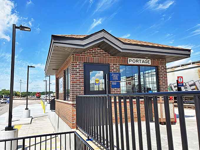 The Portage station's brick facade welcomes travelers with small-town charm and the promise of scenic journeys just beyond those doors.