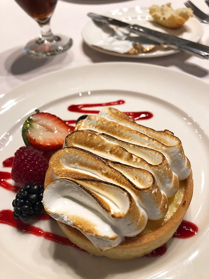 This isn't just dessert&mdash;it's edible architecture! The baked meringue peaks hide creamy treasures beneath, proving that castle dining goes beyond mere sustenance.