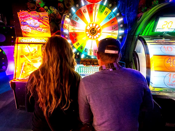 Spinning for glory at the arcade—where every light, bell, and rainbow wheel promises the thrill of victory (or at least tickets for a keychain).