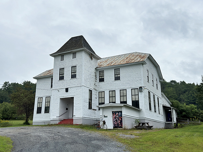 Miss Shannon's School for Girls stands as a weathered time capsule, its white clapboard exterior whispering tales of bygone eras.