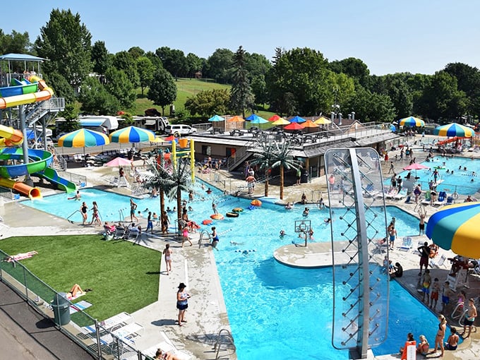 From this bird's-eye view, Kamp Dels reveals itself as an aquatic wonderland where summer memories are forged in chlorine and sunshine.
