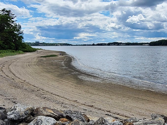 Sandy shores and gentle waves make this beach spot perfect for contemplative moments or impromptu stone skipping contests.