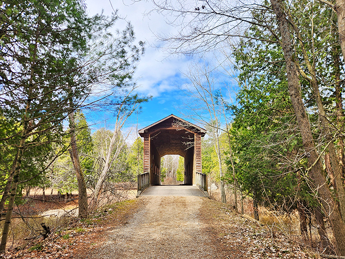The Fisher Annex Covered Bridge stands as a rustic time machine, its wooden beams telling stories of yesteryear while framing perfect photo opportunities.