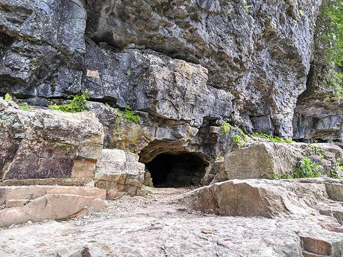 Nature's own mysterious doorway beckons the brave. This cave entrance looks like it might lead to Wisconsin's version of Narnia—just with more cheese.