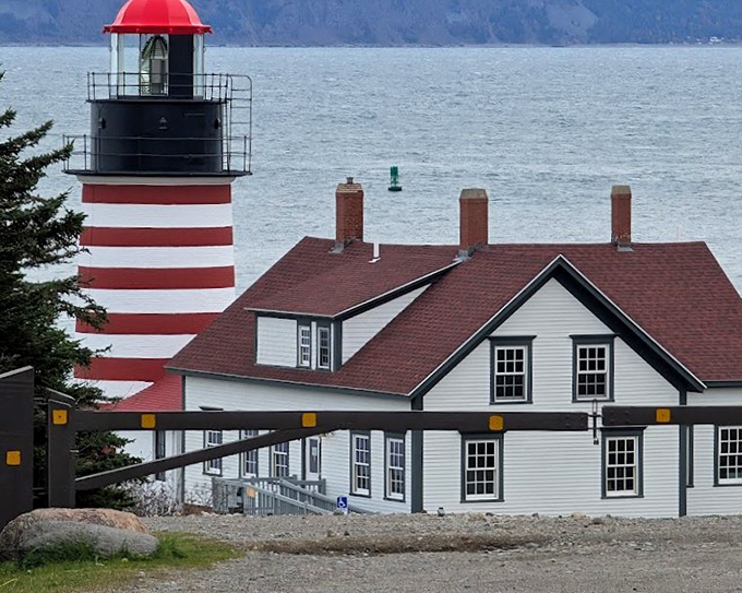 America's eastern edge: The iconic lighthouse and keeper's quarters frame a perfect postcard view that's been guiding mariners since 1858.