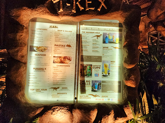 The menu at T-Rex Cafe is carved into stone (well, stone-like material) offering everything from carnivore favorites to herbivore delights.