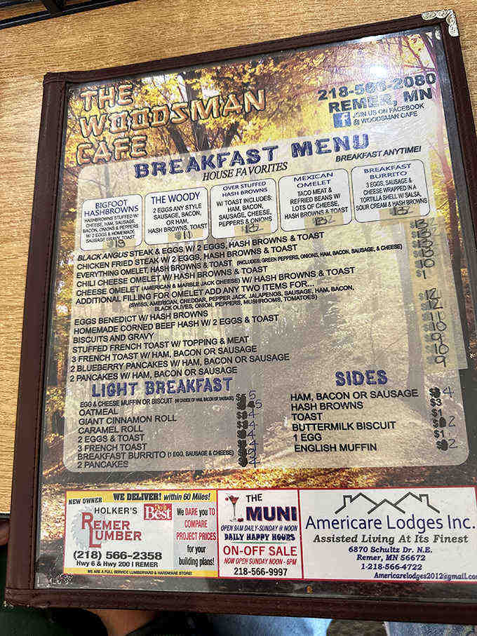 The breakfast menu showcases hearty northern Minnesota fare, with the signature "Woody" and "Bigfoot Browns" stealing the spotlight.