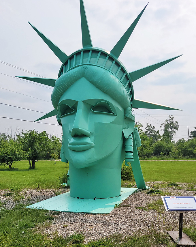 Lady Liberty stands proudly in Wisconsin, trading New York harbor for Midwestern charm while maintaining her iconic mint-green presence.