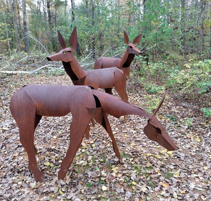 These rusted metal deer appear to have wandered straight out of a fairytale, their weathered patina telling stories of seasons past.