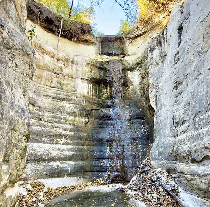 Water's patient artistry revealed: centuries of erosion have carved this hidden masterpiece just minutes from downtown St. Paul.