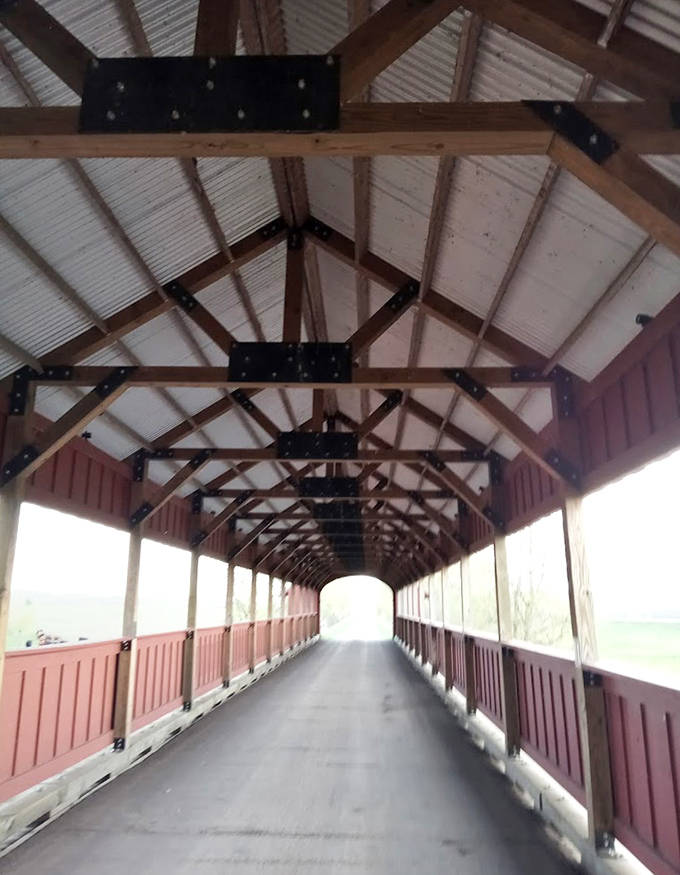 Look up! The cathedral-like wooden beams create a geometric symphony overhead that would make any architect swoon.
