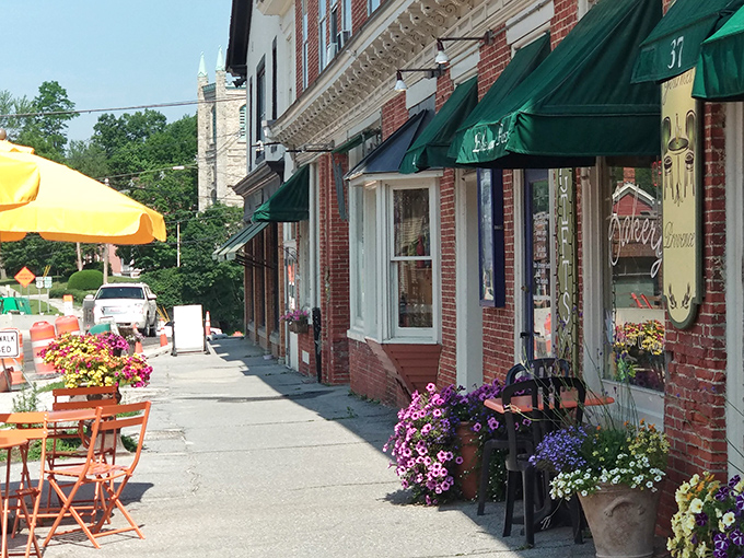 Colorful flowers frame the entrance to Gourmet Provence, where French-inspired pastries meet Vermont hospitality in delicious harmony.