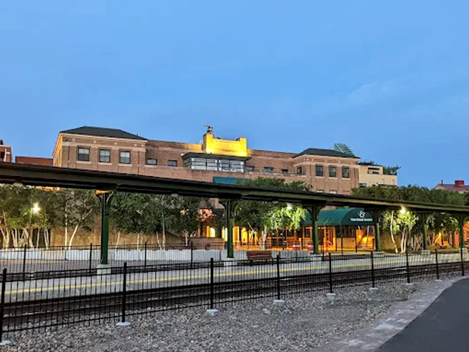 A steampunk-inspired diving bell sculpture stands as a quirky centerpiece inside, capturing the station's perfect blend of transportation functionality and artistic imagination.