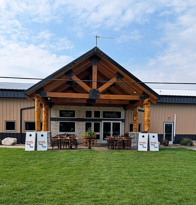 Beagio's rustic exterior with timber-framed entrance welcomes visitors to this countryside pizza haven, where small-town charm meets big-time flavor.