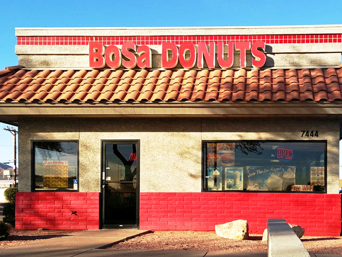 The terra cotta roof and bright signage of BoSa Donuts has become a welcome sight for donut lovers across Arizona.