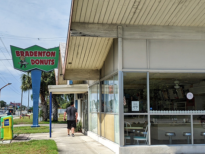 Bradenton Donuts' classic sign stands tall above its simple white building &ndash; a neighborhood landmark serving hand-crafted treats for generations.
