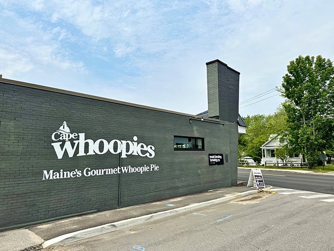 Cape Whoopies' sleek black exterior gives a modern twist to Maine's classic treat. The simple white lettering hints at the gourmet experience waiting inside.