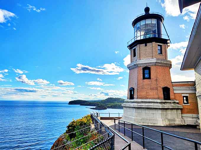Split Rock Lighthouse stands sentinel on its rocky perch, watching over the vast blue expanse of Lake Superior like a faithful guardian.