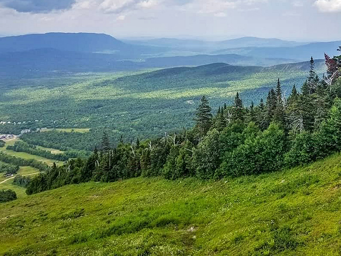 Sugarloaf Mountain's summer coat reveals rolling hills stretching to the horizon, a green sea of wilderness that makes everyday worries seem wonderfully small.