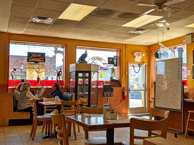 Zef's comfortable interior invites you to settle in and stay awhile &ndash; the perfect setting for Bay City's most beloved Coney experience.