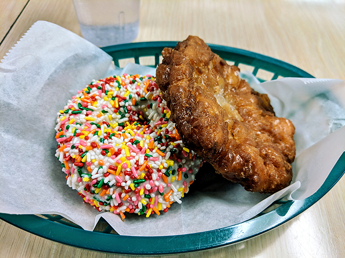 Rainbow sprinkles brighten these golden-fried donuts, while the legendary apple fritters show off their chunky, cinnamon-spiced goodness.