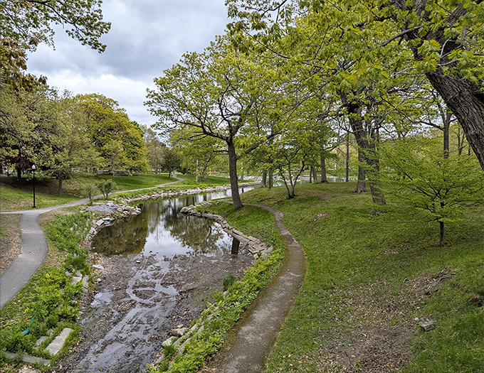 Winding paths and gentle streams make Deering Oaks Park a green sanctuary in the heart of Portland, perfect for afternoon strolls.