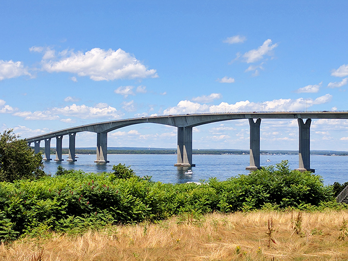 Sunlight dances across the Jamestown Verrazzano Bridge. This graceful span connects Rhode Island's mainland to Jamestown with style and spectacular views.
