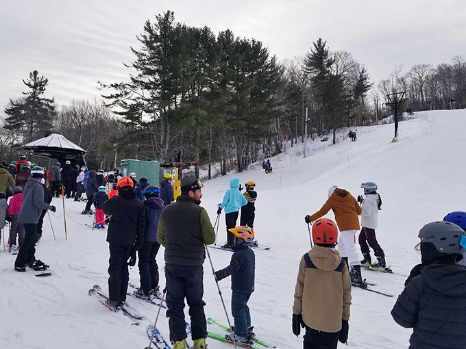 Families and skiers of all ages gathered at the base of Camden Snow Bowl, preparing for a day of winter fun on Maine's unique ocean-view slopes.