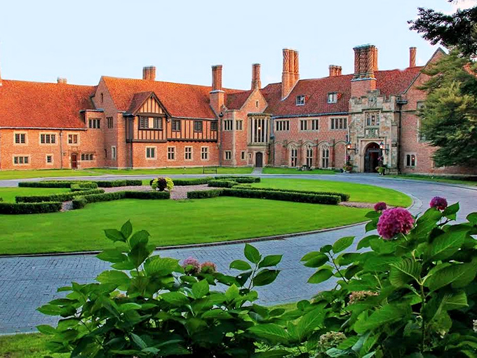 The meticulously maintained gardens of Meadow Brook Hall create a regal approach to this American castle, complete with manicured hedges and vibrant blooms.