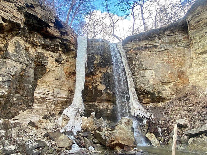 The vertical drop of Minnemishinona Falls creates a natural curtain of water, especially impressive during spring runoff.