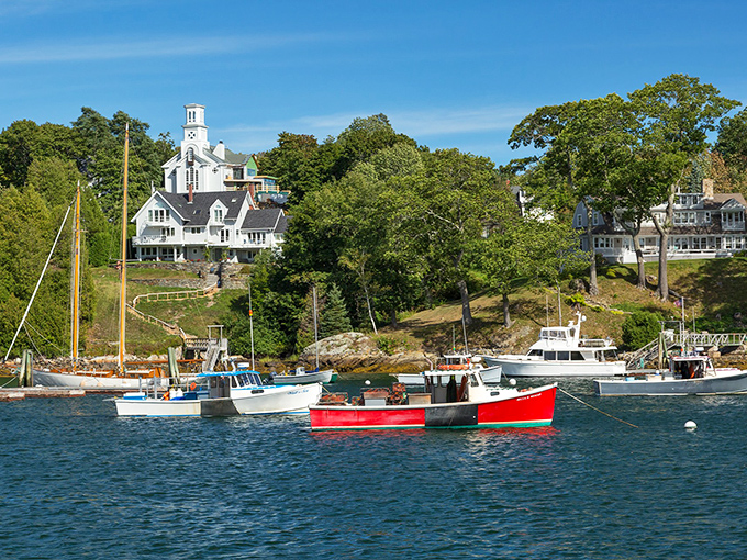 White house steeples rise above Rockport's waterfront homes, creating that quintessential New England coastal village scene.