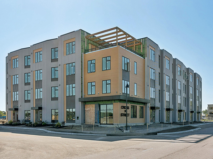 Urban elegance meets Maine practicality in this contemporary development, where brick and glass create spaces for both living and gathering.