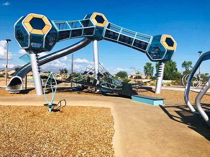 The hexagonal climbing structures create a sci-fi playground experience. Who needs video games when reality looks this cool?