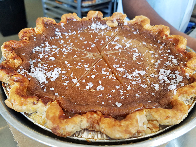 A salted maple custard masterpiece with perfectly crimped edges and that signature sprinkle of sea salt that makes taste buds sing.