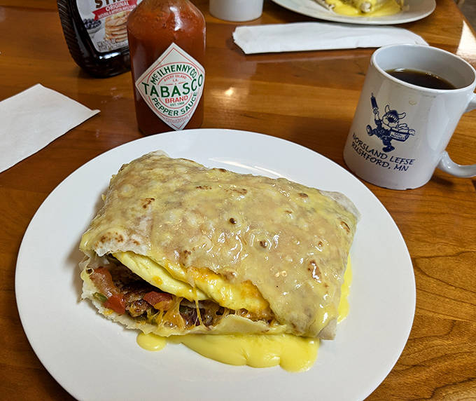 The Breakfast Lefse Wrap &ndash; where eggs, hashbrowns, and cheese meet their Norwegian destiny. That hollandaise sauce is practically singing ABBA.