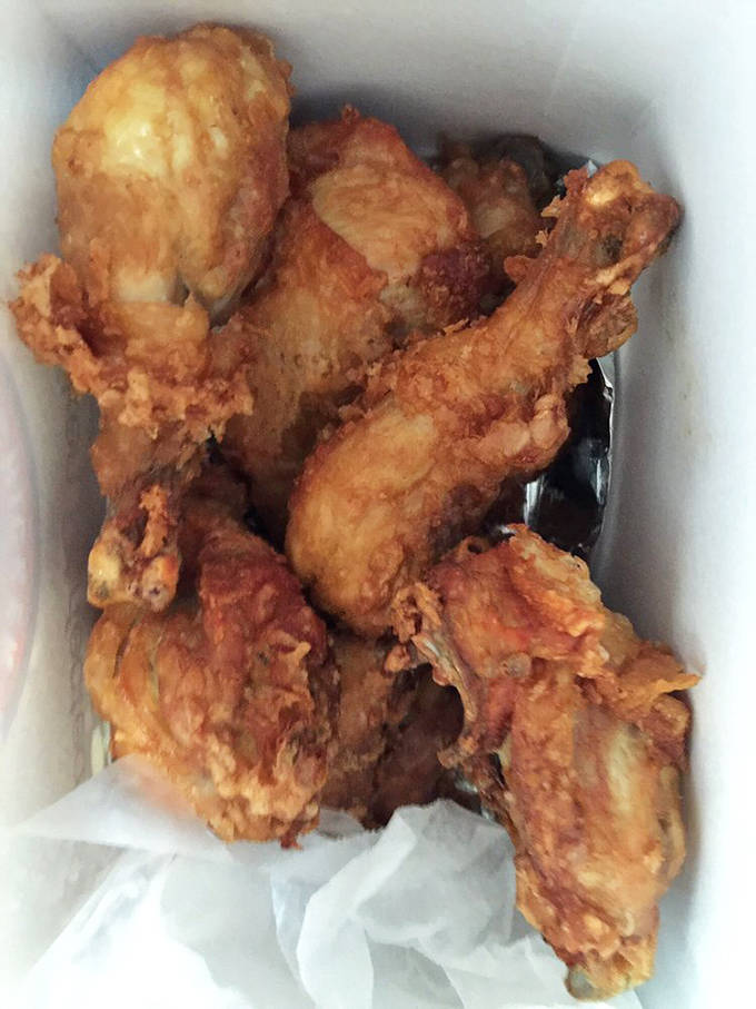 Golden-brown perfection in every bite &ndash; this isn't just chicken, it's a crispy, juicy masterpiece that's worth crossing state lines for.