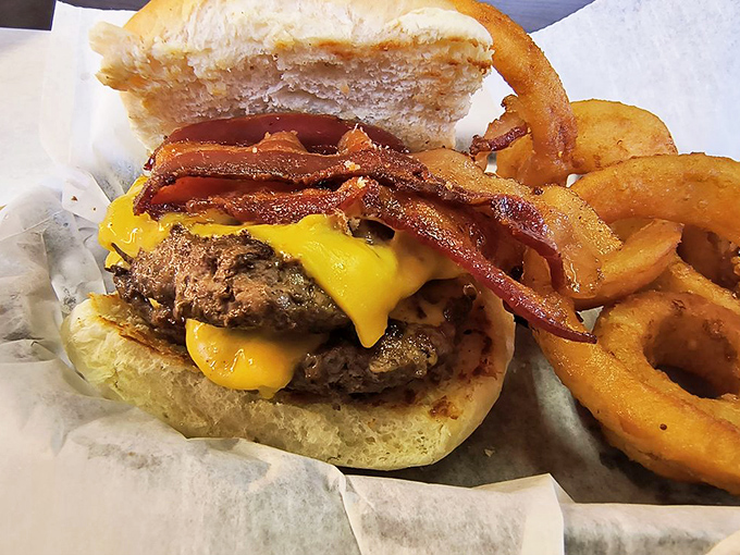 This isn't just any cheeseburger&mdash;it's a juicy masterpiece with melty American cheese that drips down your fingers, reminding you why simple food done right is unbeatable.