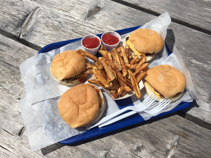 Burger perfection doesn't require fancy toppings &ndash; just perfectly grilled patties, fresh buns, and the right balance of classic condiments.