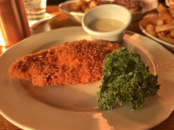 Golden-crusted perfection on a plate&mdash;this chicken cutlet arrives with a crisp exterior guarding tender meat within.