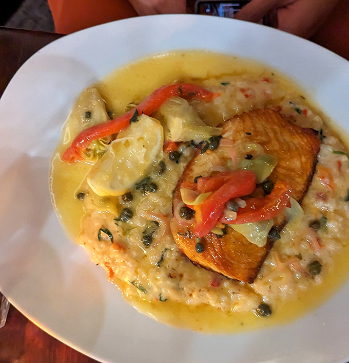 Tender chicken piccata rests in a bright lemon-capers sauce, served over creamy, flavor-packed risotto.