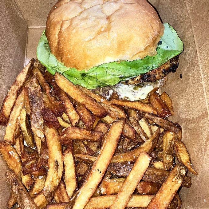 Burger perfection doesn't happen by accident. This beauty with hand-cut fries represents Vermont's farm-to-table philosophy in its most delicious form.