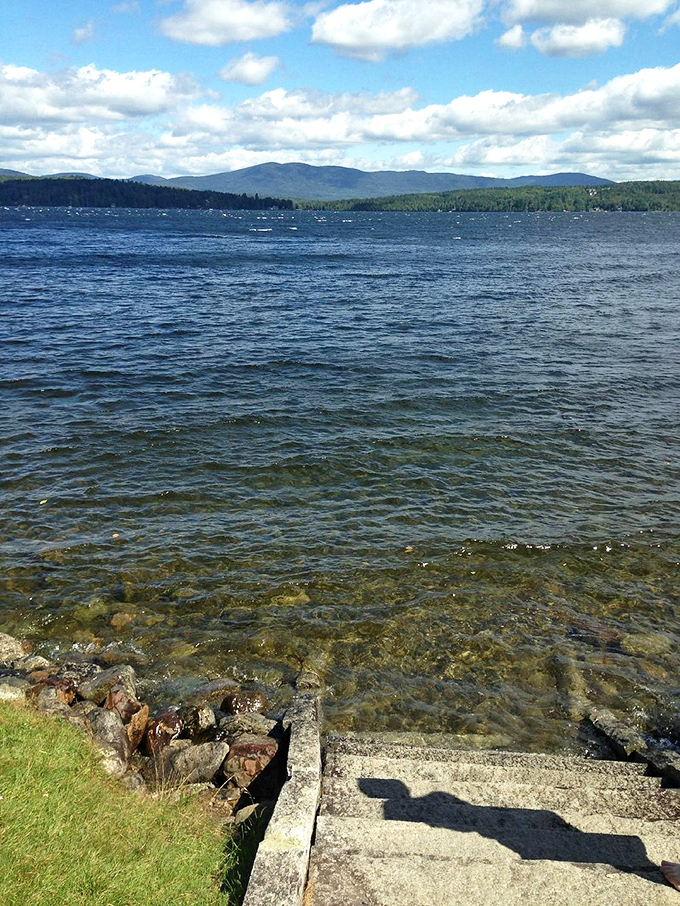 Crystal clear waters reveal a pebbled lakebed near the shore &ndash; so pristine you'd think Mother Nature hired a cleaning service just before your arrival.