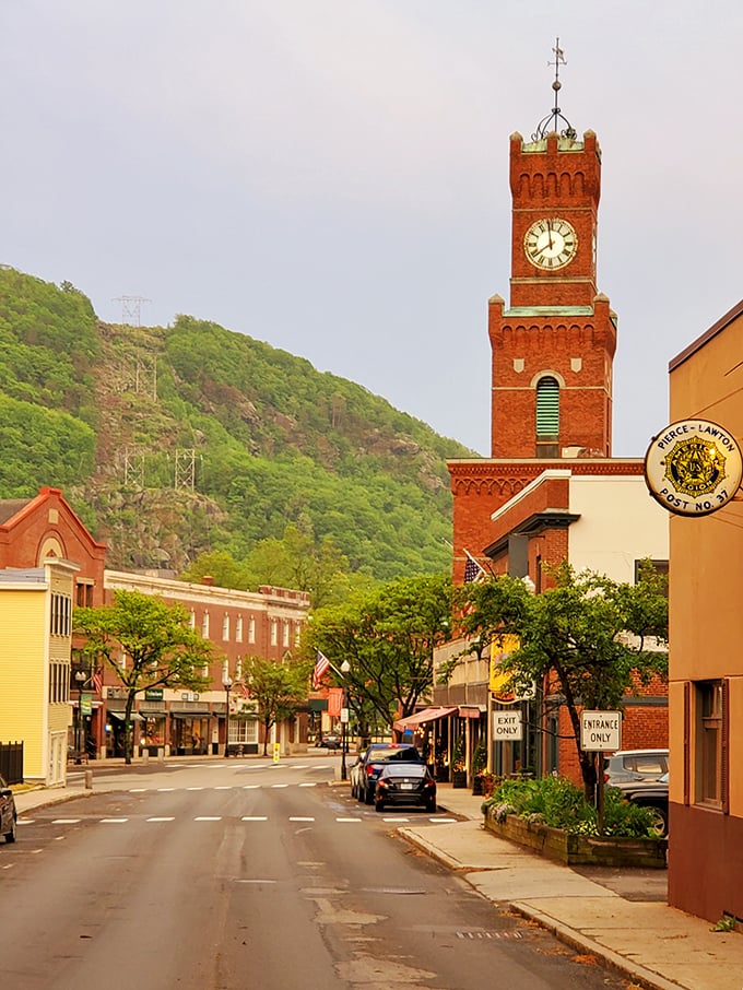 The iconic brick clock tower stands sentinel over the town, its timeless face watching over generations of Bellows Falls residents and visitors.