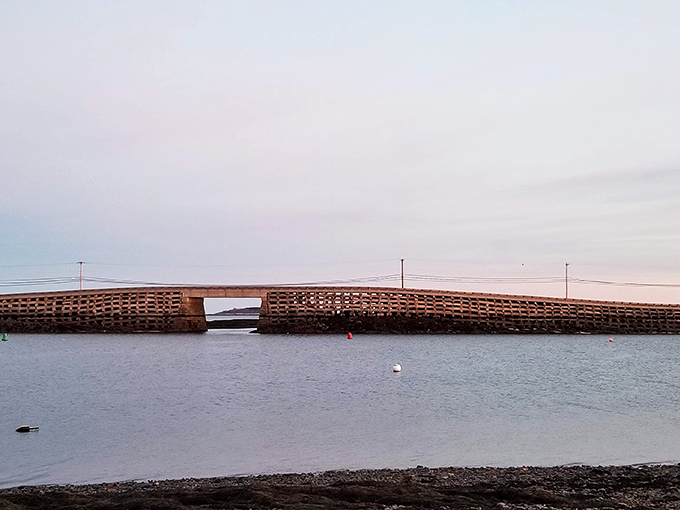 The bridge's cribstone design at water level, demonstrating how tides flow freely through the structure.
